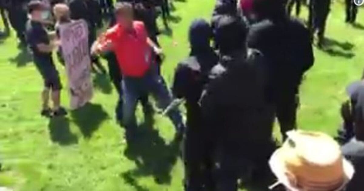 From peace activists to black-clad attackers in under a week - Liberty ...